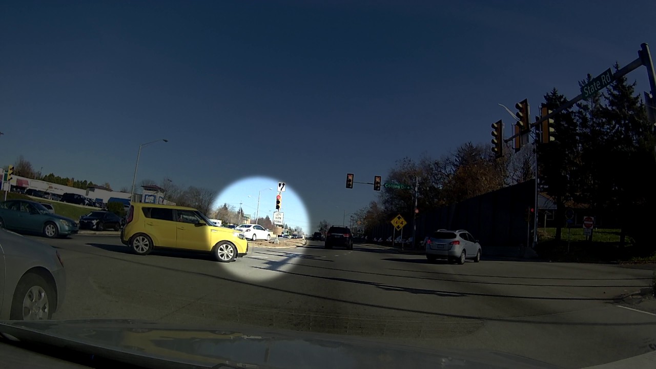 Car Drives Over Median - YouTube