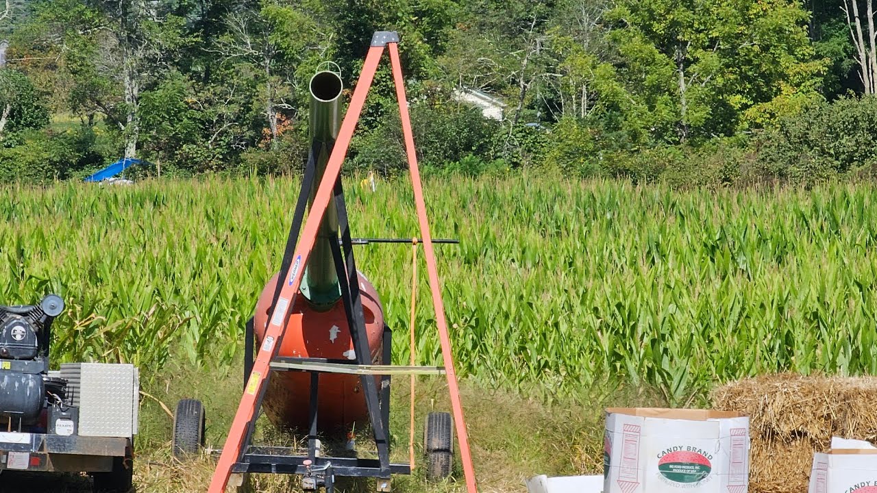 Firing the Ashe Co. Pumpkin Cannon 300 yards/25psi - YouTube