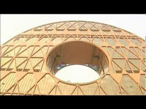Building That Looks Like Chinese Coin Completes Construction - YouTube