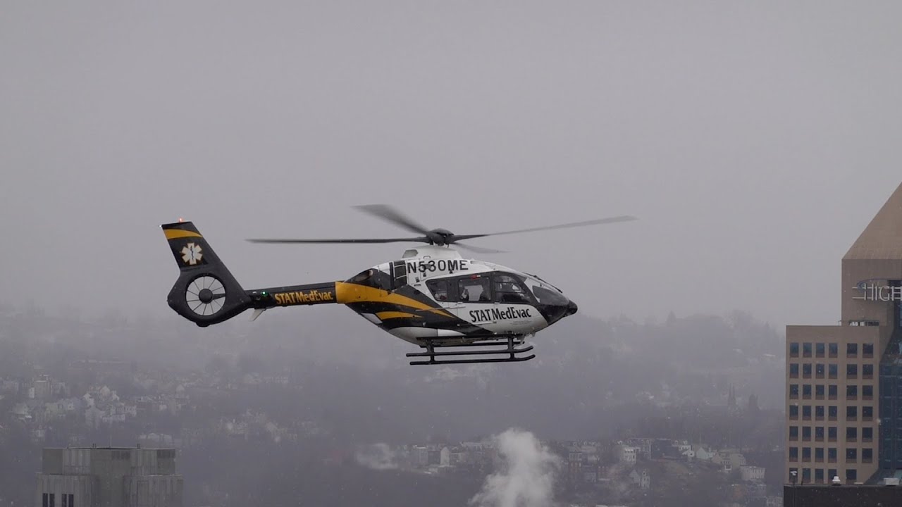 View of Downtown Pittsburgh, Pennsylvania and STAT MedEvac Helicopter ...