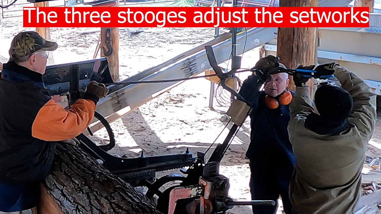 Doug Sawing rotten logs for a hay wagon - YouTube