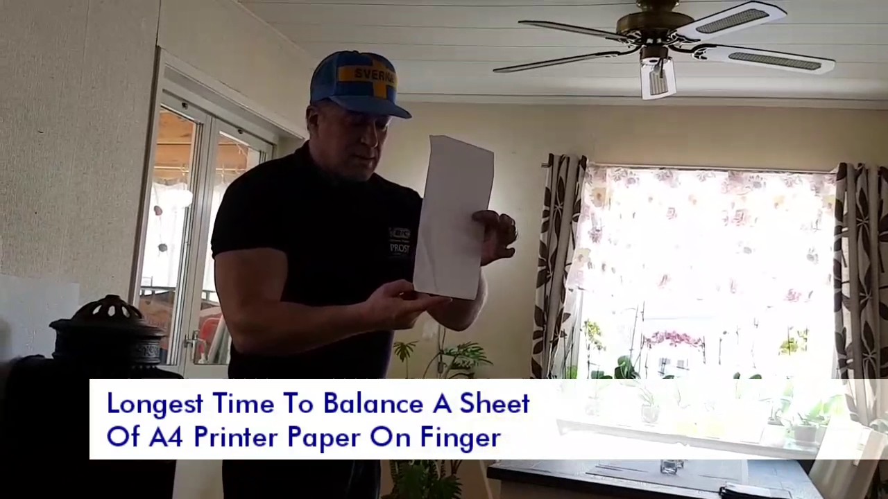 Longest Time To Balance A Sheet Of A4 Printer Paper On Finger - YouTube