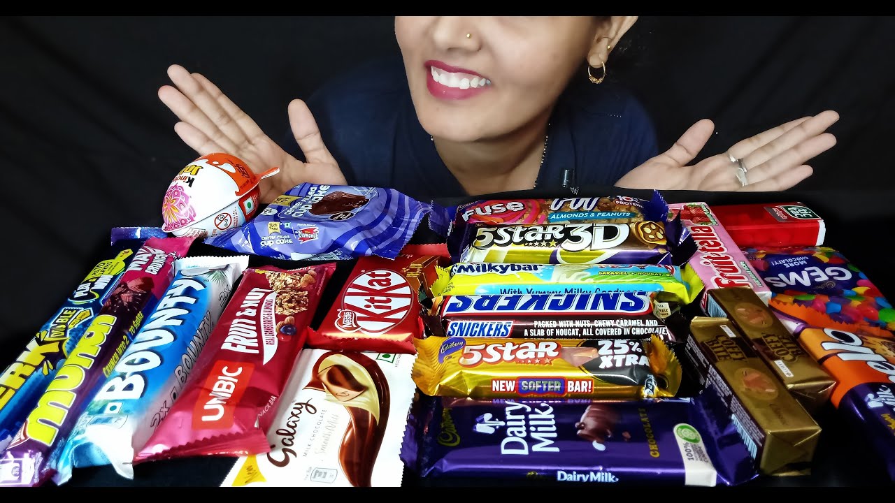 Eating Chocolates, Kit Kat, Cadbury, 5 Star, Snickers, Fusion, Munch ...