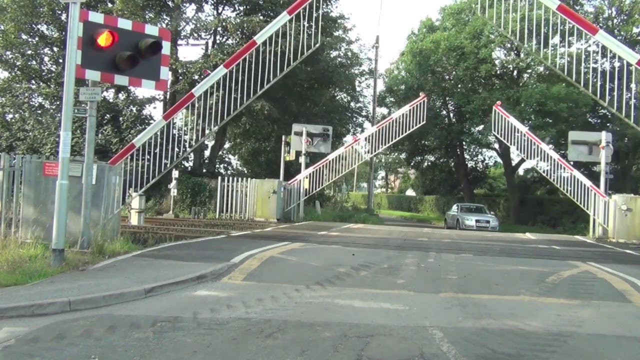 Four Lane Ends Level Crossing - YouTube