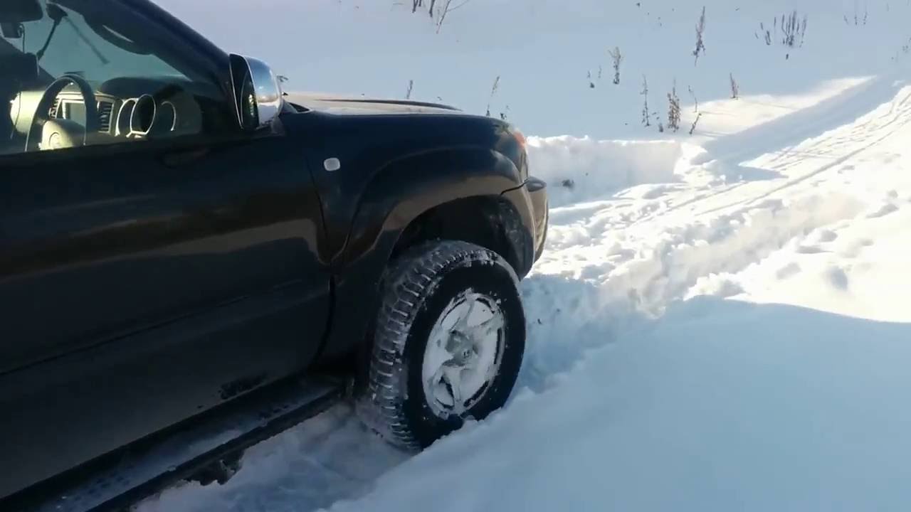 Toyota Hilux SURF 4.0 and snowy hill - YouTube