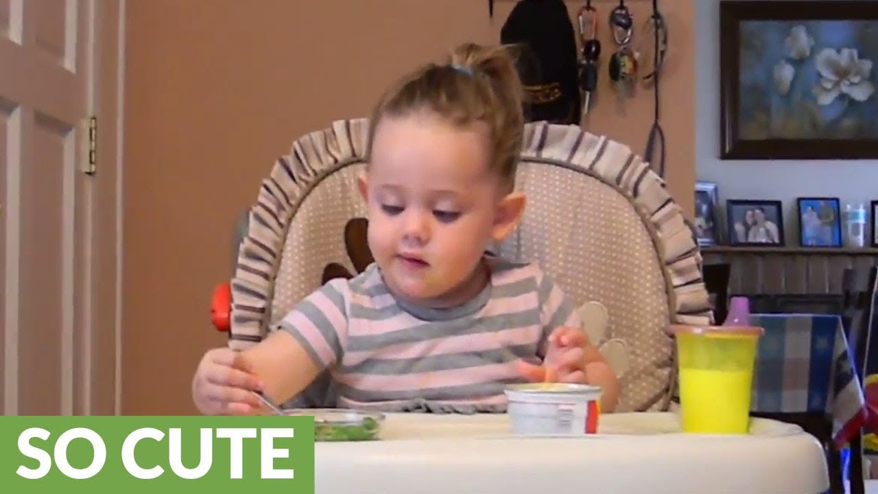 Toddler adorably "curses" at slippery food - YouTube