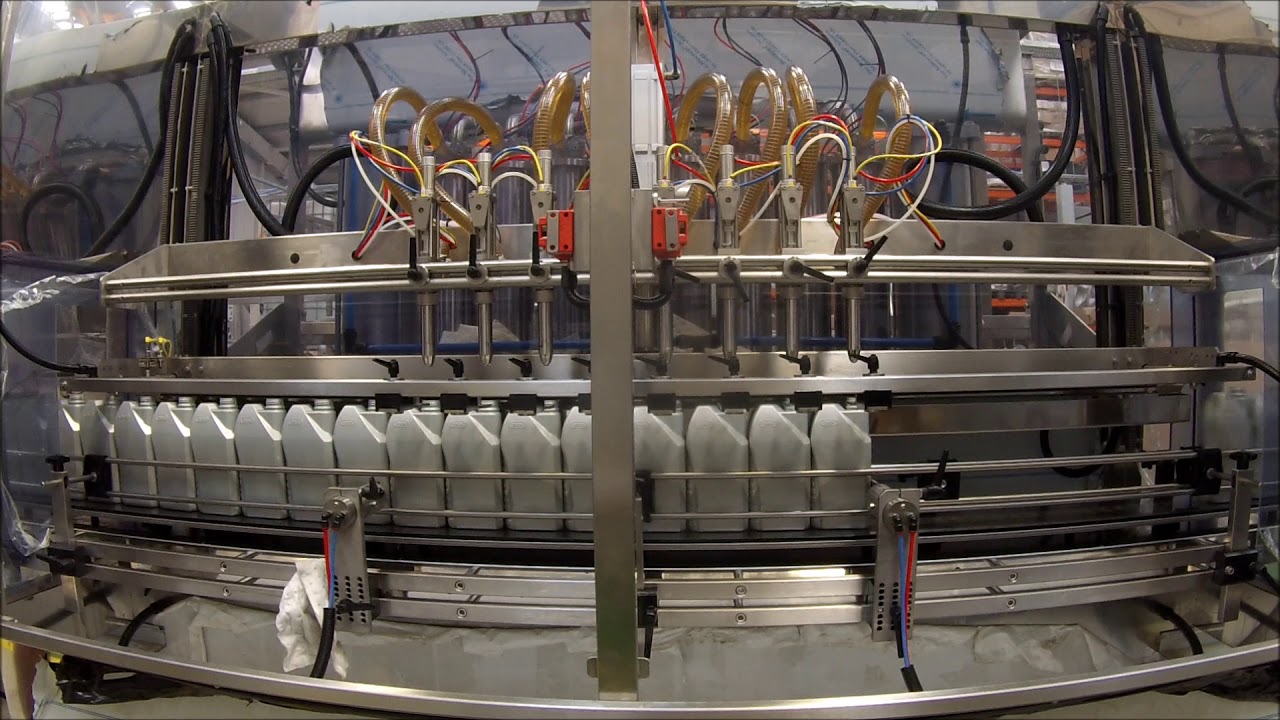 Adelphi Masterfil's S5000-A eight head filling machine, for chemical ...