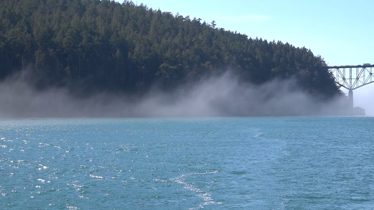 Fog coming through Deception Pass - YouTube
