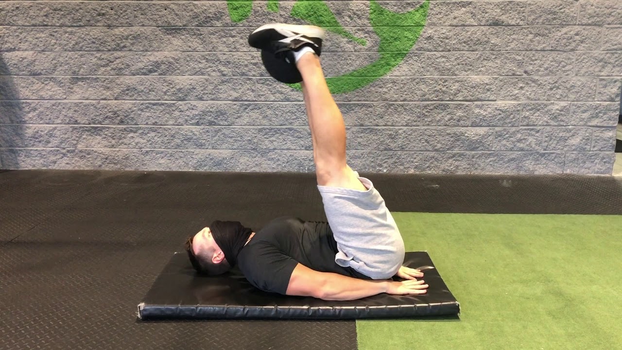 Medicine ball leg lift - YouTube