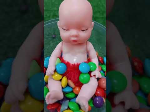 doll mixing rainbow candy and magic Skittles #shorts - YouTube
