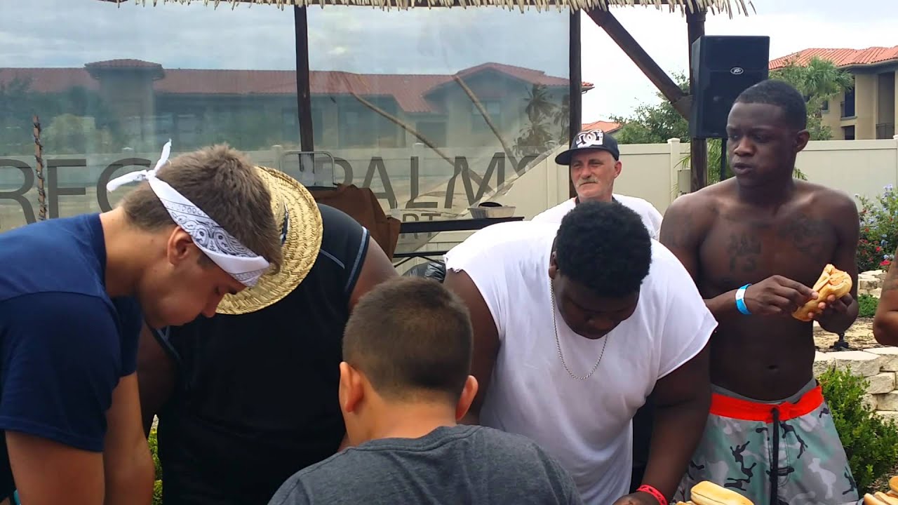 Hot dog eating contest (hiding hotdogs under hat)! - YouTube