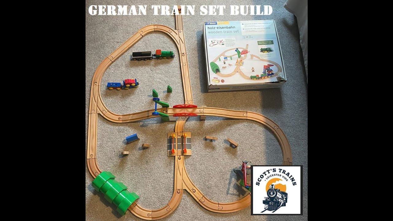 Wooden trains - German train set build, running the train - YouTube