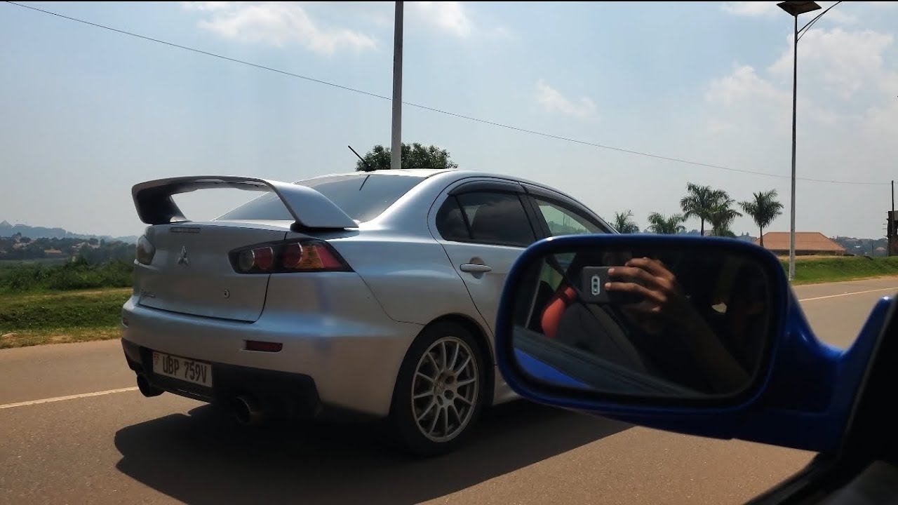 Subaru Gc8 Type RA and Mitsubishi Evo X cruising down the highway ...