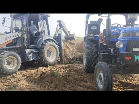 Terex jcb machine 3dx 4x4 xpert backhoe loader loading trolley stuck in ...