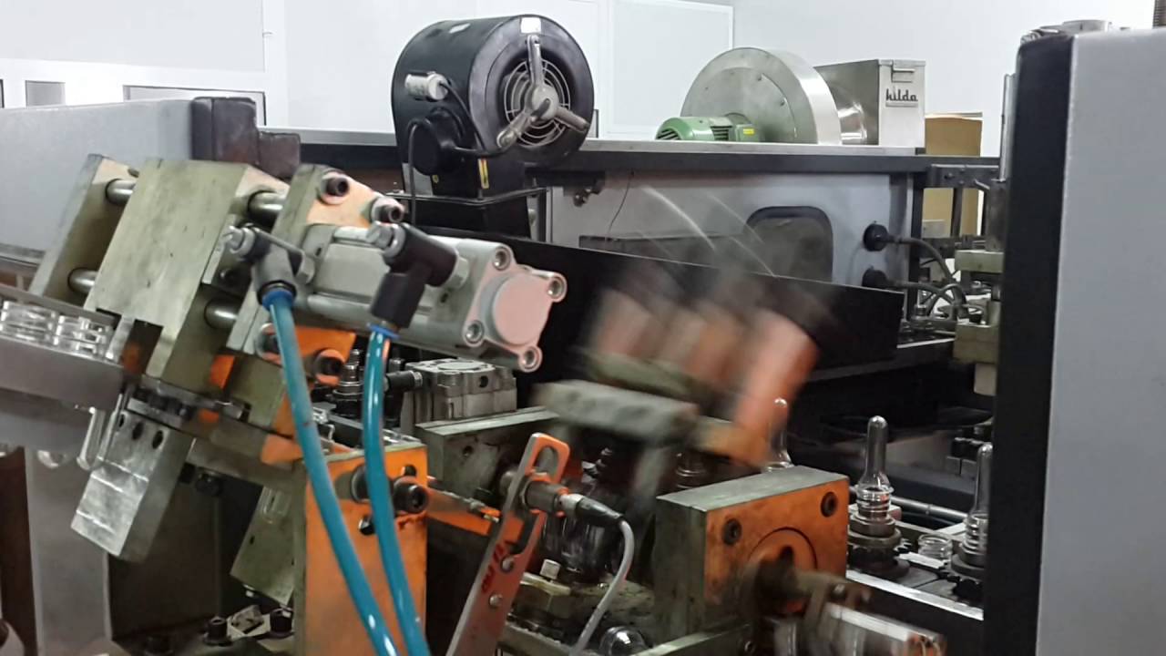 4 cavity Blowing machine - YouTube