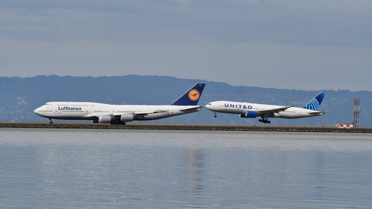 Lufthansa Boeing 747-8 on Take off roll gets joined by United 777-200 ...