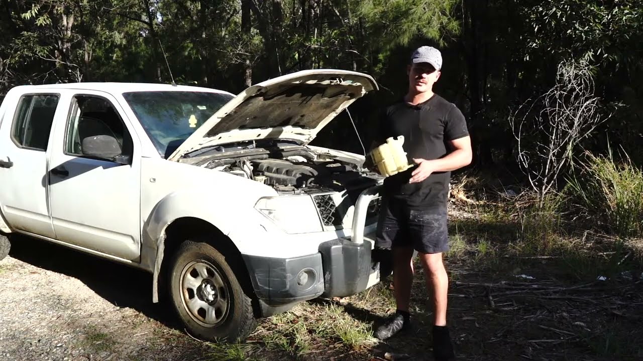 How to Remove and Replace a Nissan Navara D40 Coolant Tank Overflow ...