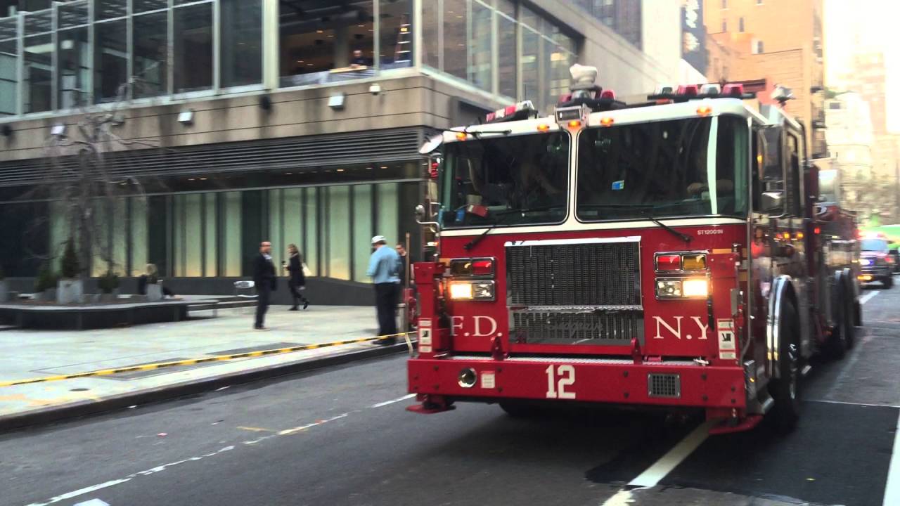 FDNY TOWER LADDER 12 TAKING UP FROM REPORTS OF A FIRE ON W. 27TH STREET ...