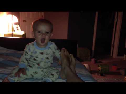 Edward hyper during bedtime, trying to bite mama's toes!