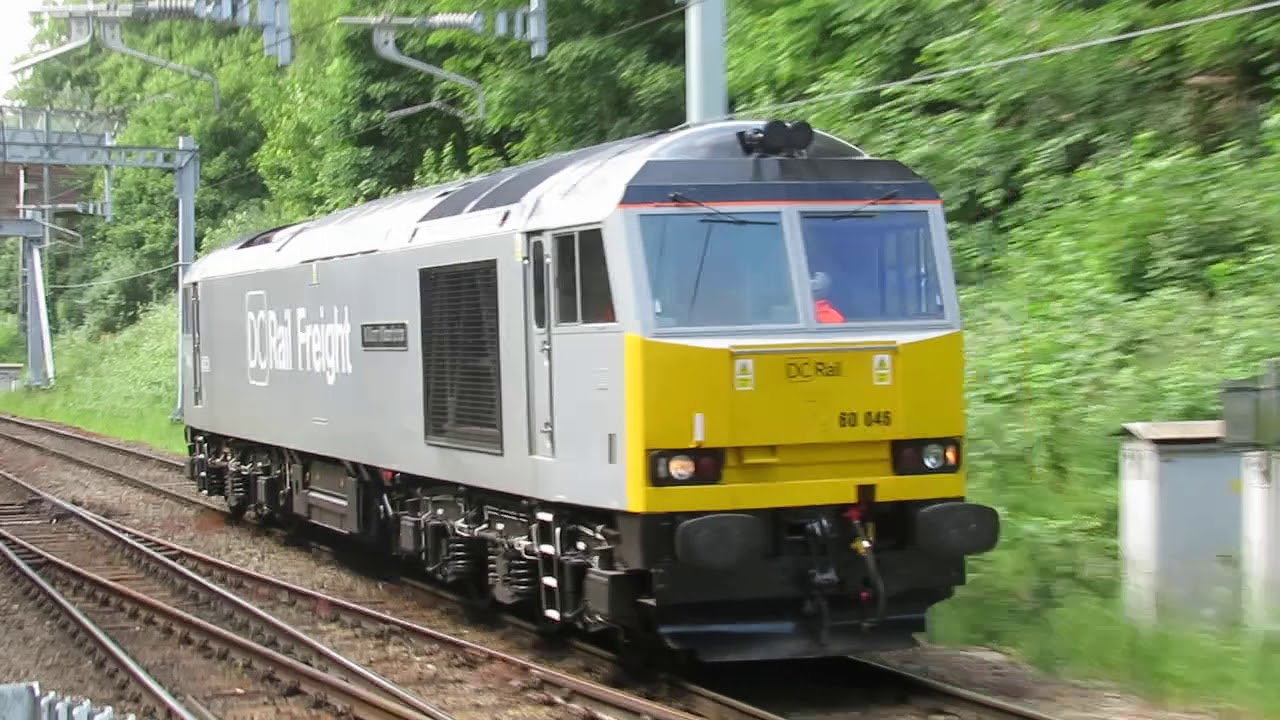 UK: DCRail Class 60 locomotive 60046 passes Reading West station on a ...