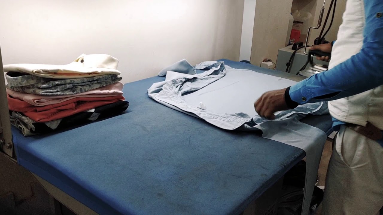 Steam press of clothes. - YouTube