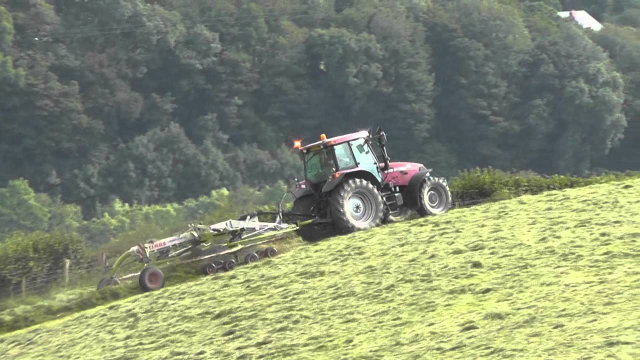 Silage 2011 Raking with Claas 2800 and Case 120 - YouTube
