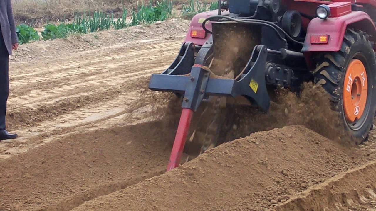 Chain Ditcher machine working Video - YouTube