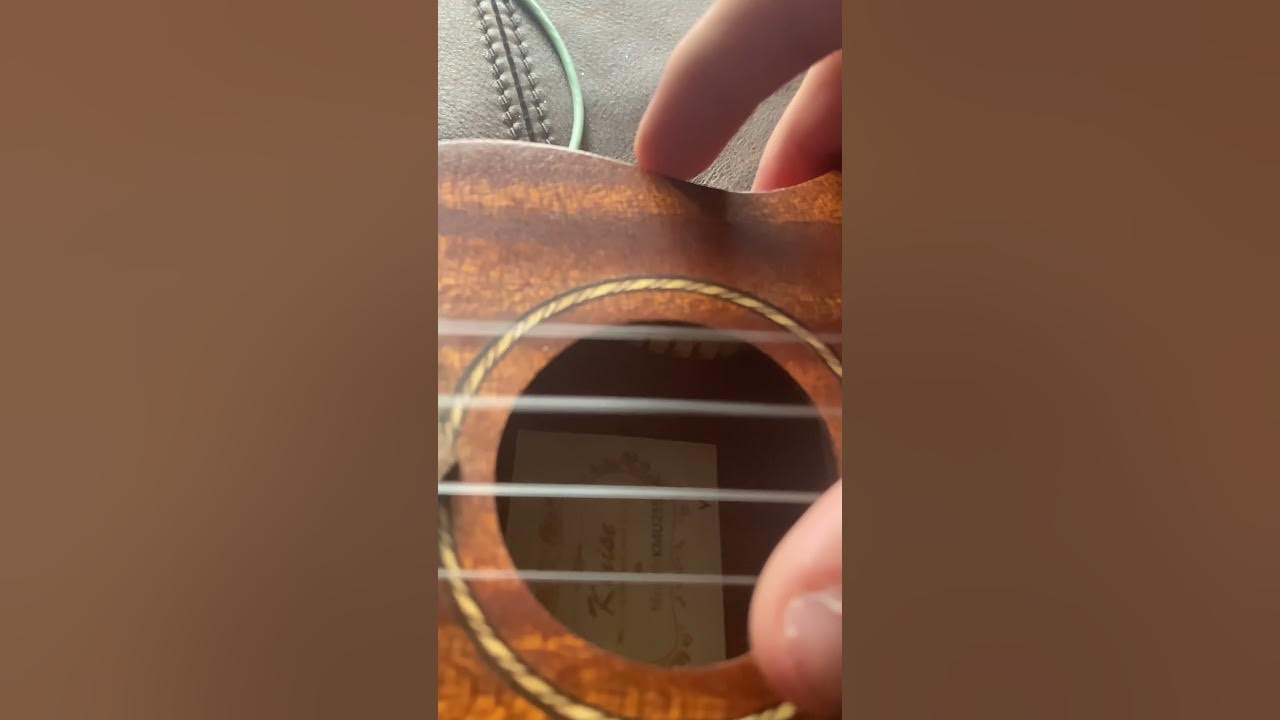 What do guitar strings look like in slo motion? - YouTube