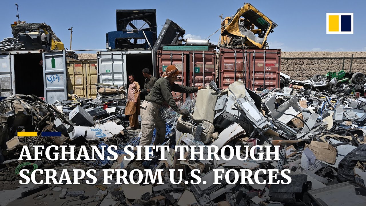 Afghans sift through US military junkyard for scraps to sell - YouTube