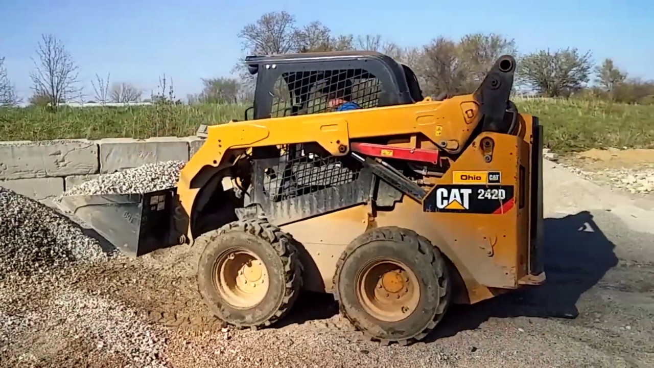 Caterpillar 242D - YouTube