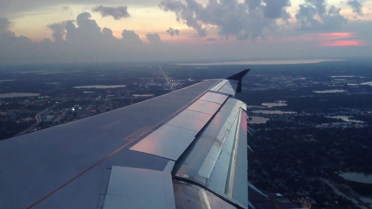Sunset Lightning! US Airways Airbus A321 Landing Orlando - YouTube