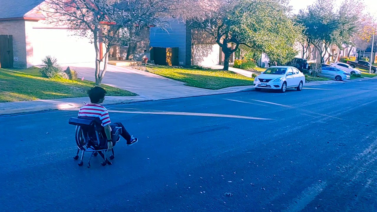 Sped kid rolls down street and dies - YouTube