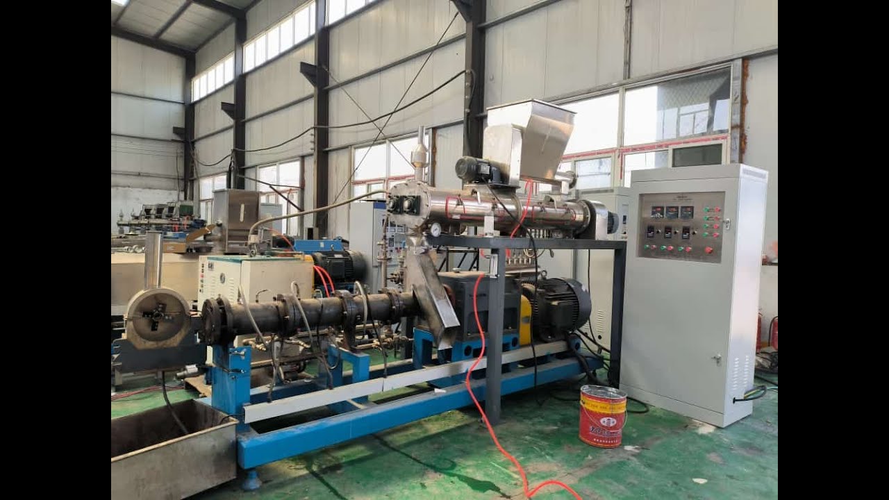 Fish feed extruder machine pet feed steam pre-conditioner trial video ...