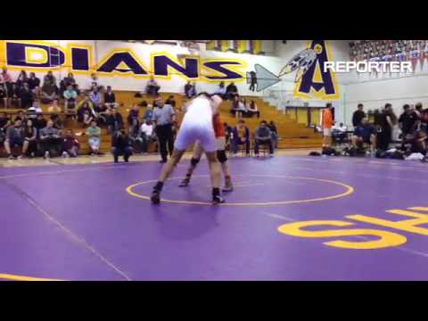 Vaca High wrestler, Eric Uldall battles his opponent in the ...