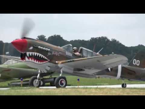 Thom Richard P-40 Warhawk aerobatics at WWII Weekend air show - YouTube