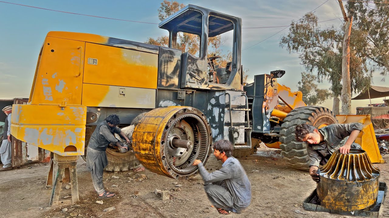 Expert mechanic’s Caterpillar loader Wheel drum seal kit change change ...