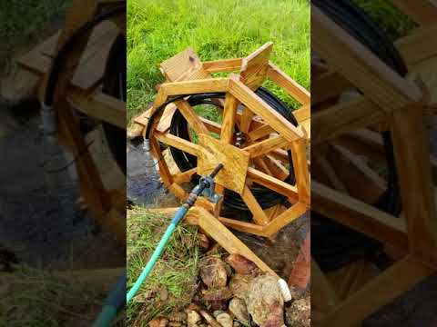 Water wheel spiral pump - YouTube