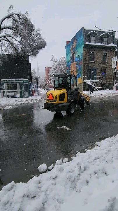 Sidewalk Plow Crusing Down Street Corner - YouTube