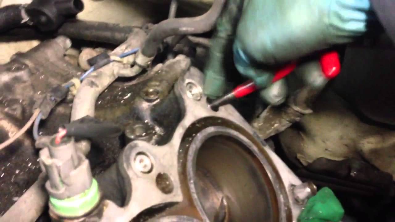 93 Acura legend head bolts retap - YouTube