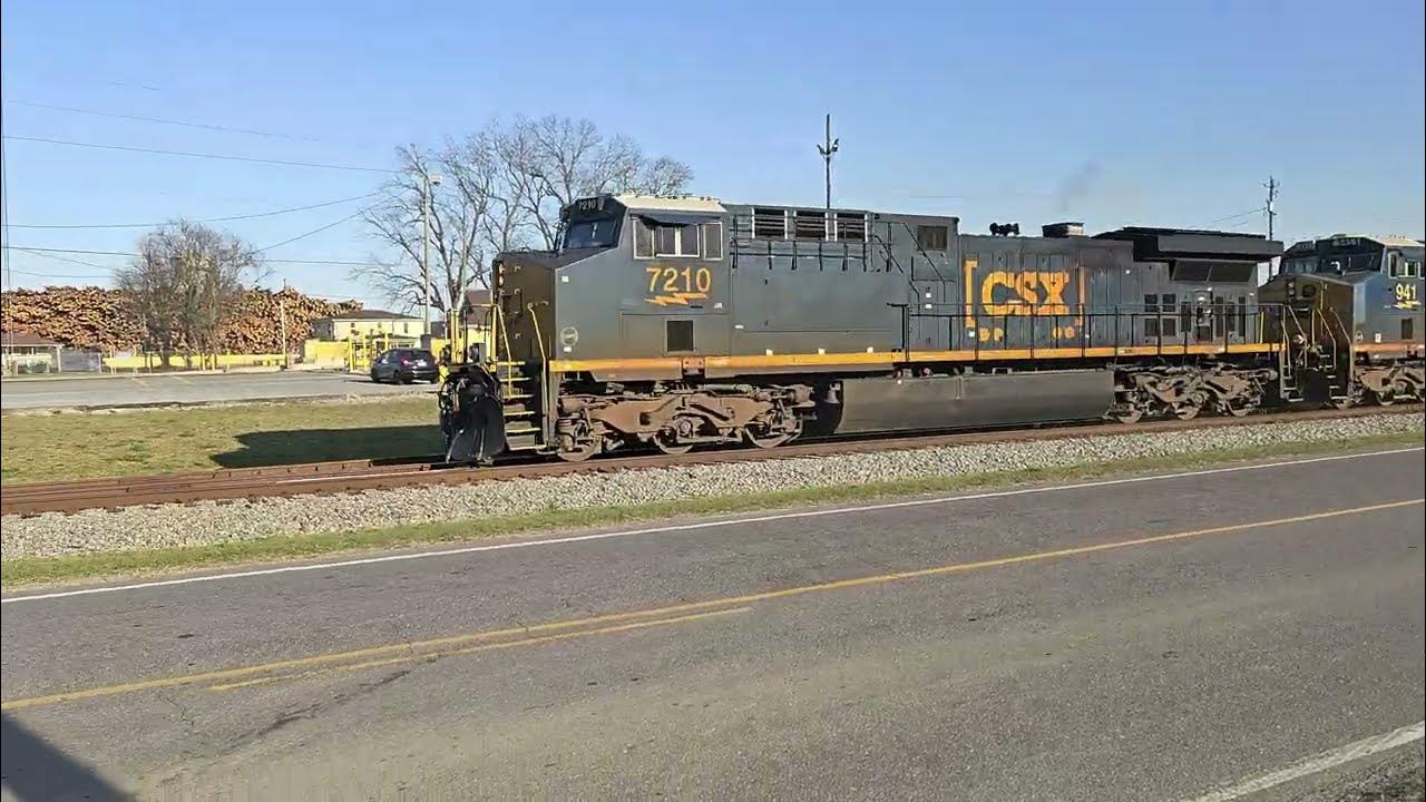 CM44AC & ES44AH Leads an CSX Empty Grain Train with a Fouled K5LA Horn which sounds good - YouTube