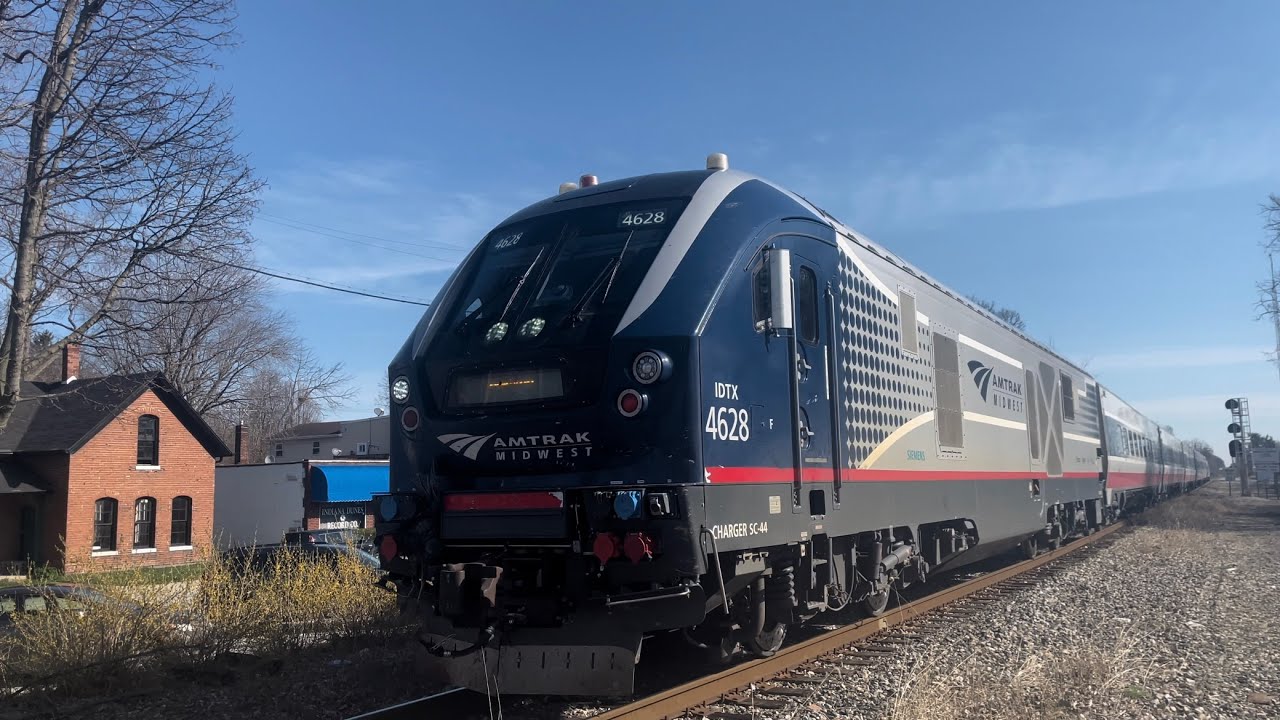 Amtrak 351 passes Porter - YouTube