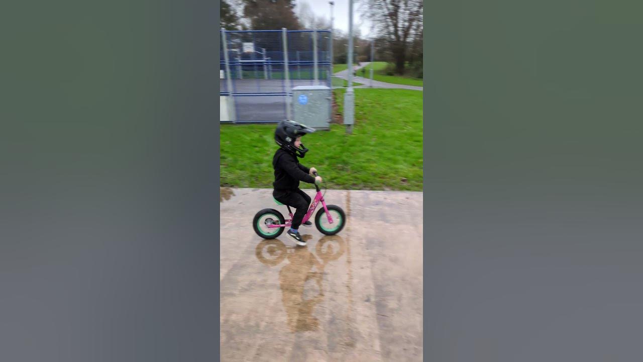 Wincanton SK8 park.very wet but didn't stop him pinching his sister balance bike for a spin ...