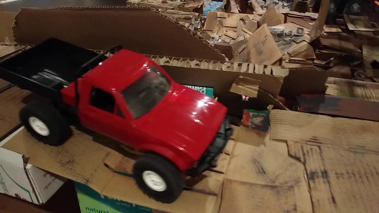 Upgraded 1/16 WPL C14 on cardboard crawler course 2 - YouTube