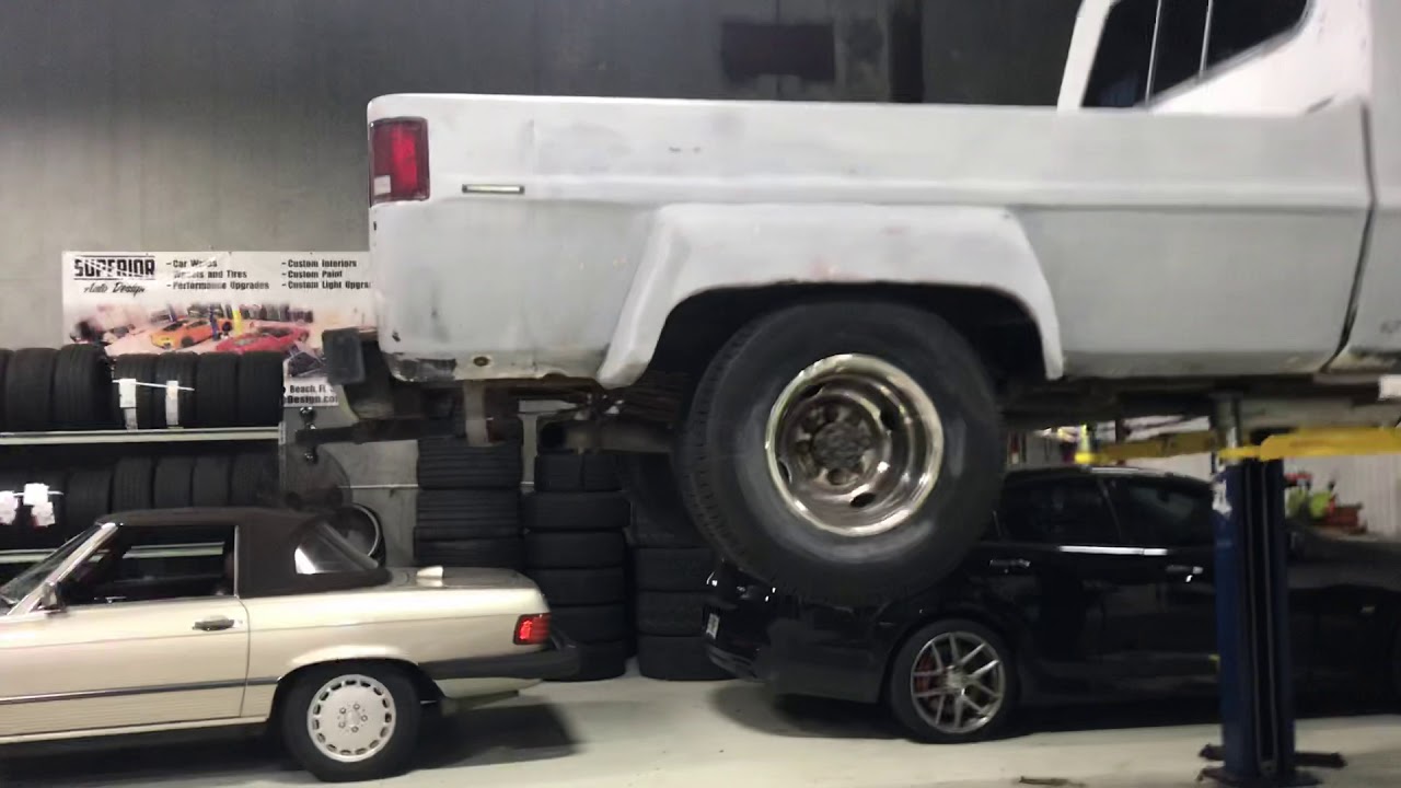 1987 Ford E350 Cabriolet Centurion Conversion Van on lift for ...