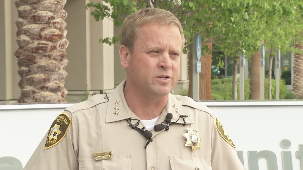 Las Vegas police officer wearing body camera facing battery case - YouTube