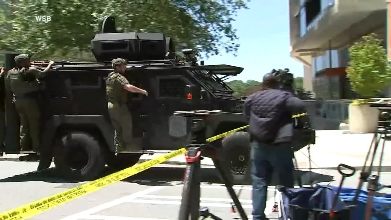 Atlanta mass shooting suspect in custody, woman killed ID'd - YouTube