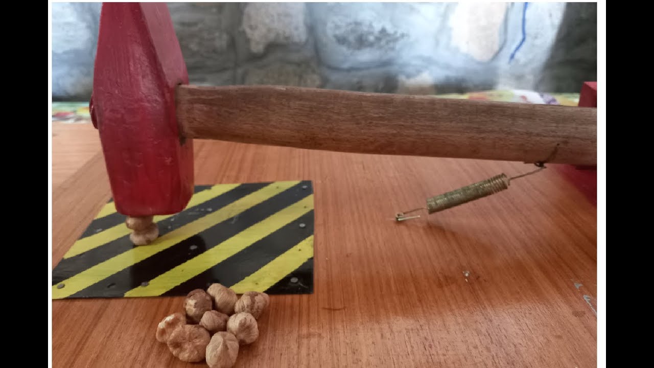 EXPERIMENT Hammer catapult VS Hazelnut - YouTube