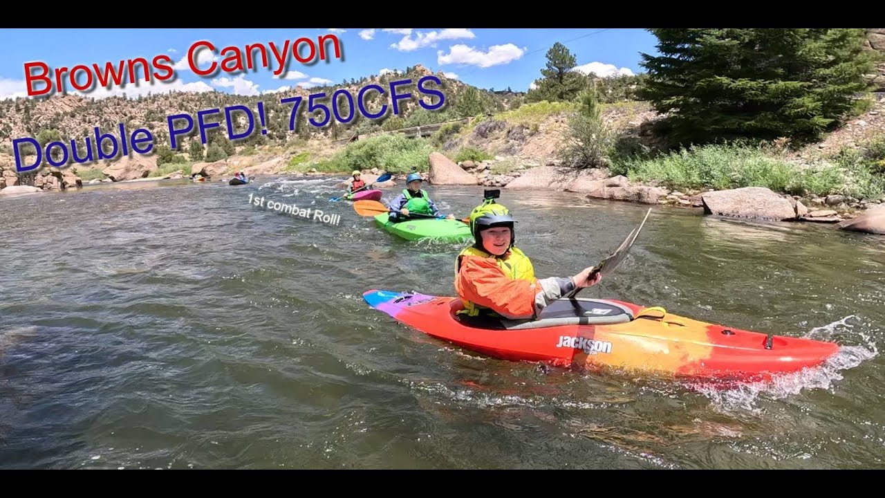 Kayaking Browns @750cfs with a DOUBLE PFD and a first time combat roll ...