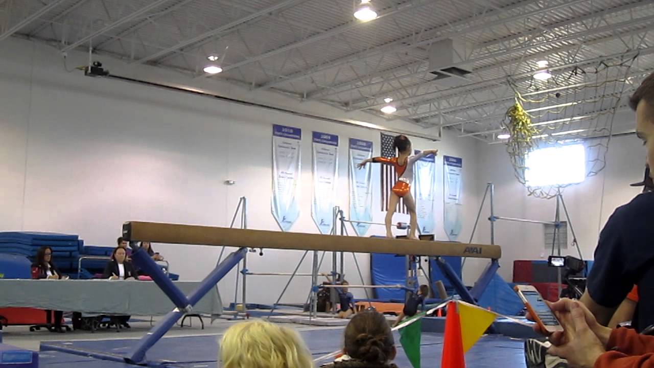 7 year old LEVEL 5 gymnast Maddie Larson Airborne meet BEAM - YouTube