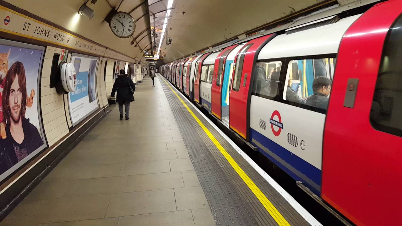 Jubilee line 1996 stock arrives and departs St John's Wood - YouTube